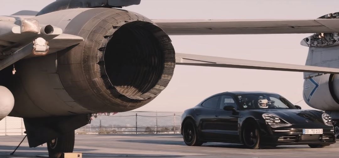 Watch: Porsche Taycan shows that 145km/h on an aircraft carr - Driven Car Guide